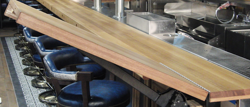 Flip-Up Countertops with Motion Control for Bars